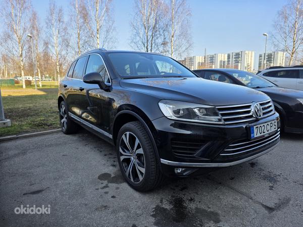 Black Volkswagen Touareg 2015 in Tallinn, with an engine capacity of 3.00 L and mileage of 128 thousand km for 19500 €, photo 2 on AUTOMOTO.COM.LV