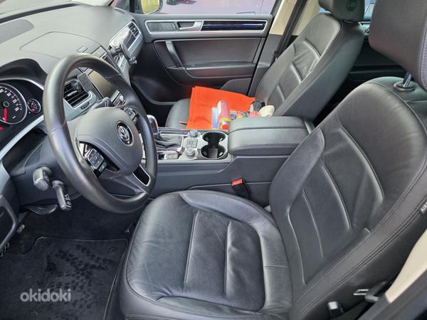 Black Volkswagen Touareg 2015 in Tallinn, with an engine capacity of 3.00 L and mileage of 128 thousand km for 19500 €, photo 4 on AUTOMOTO.COM.LV