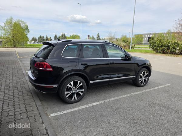 Black Volkswagen Touareg 2015 in Tallinn, with an engine capacity of 3.00 L and mileage of 128 thousand km for 19500 €, photo 5 on AUTOMOTO.COM.LV
