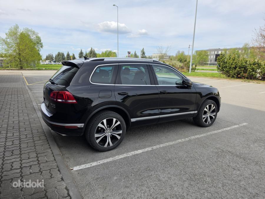 Black Volkswagen Touareg 2015 in Tallinn, with an engine capacity of 3.00 L and mileage of 128 thousand km for 19500 €, photo 6 on AUTOMOTO.COM.LV