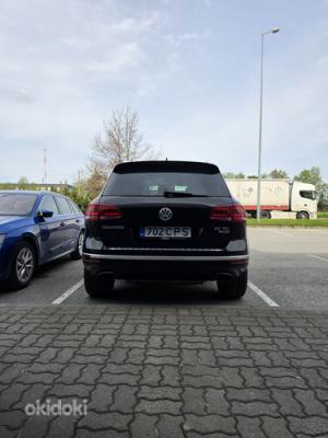 Black Volkswagen Touareg 2015 in Tallinn, with an engine capacity of 3.00 L and mileage of 128 thousand km for 19500 €, photo 9 on AUTOMOTO.COM.LV