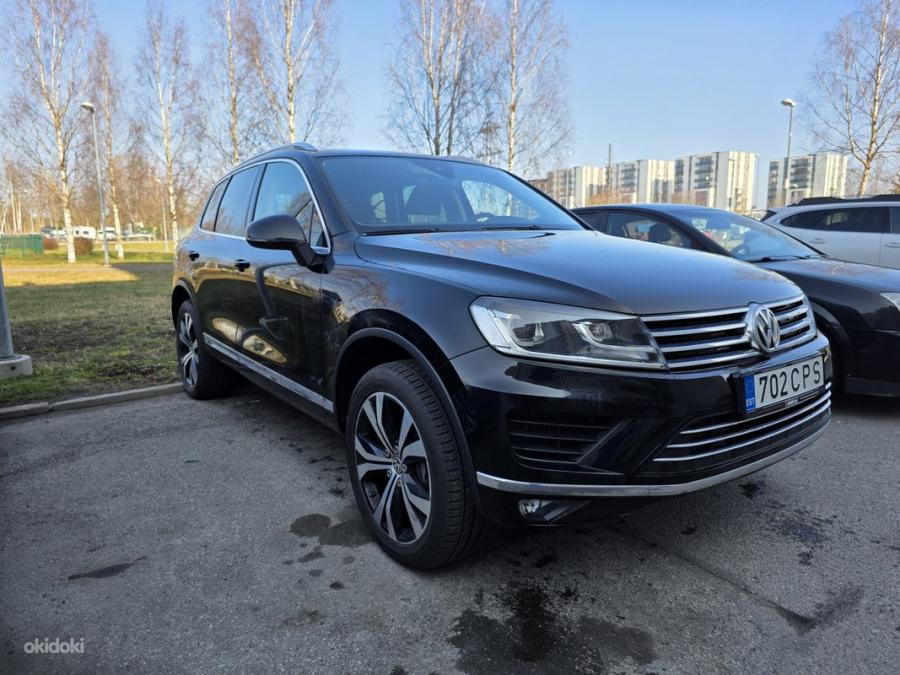 Black Volkswagen Touareg 2015 in Tallinn, with an engine capacity of 3.00 L and mileage of 128 thousand km for 19500 €, photo 14 on AUTOMOTO.COM.LV