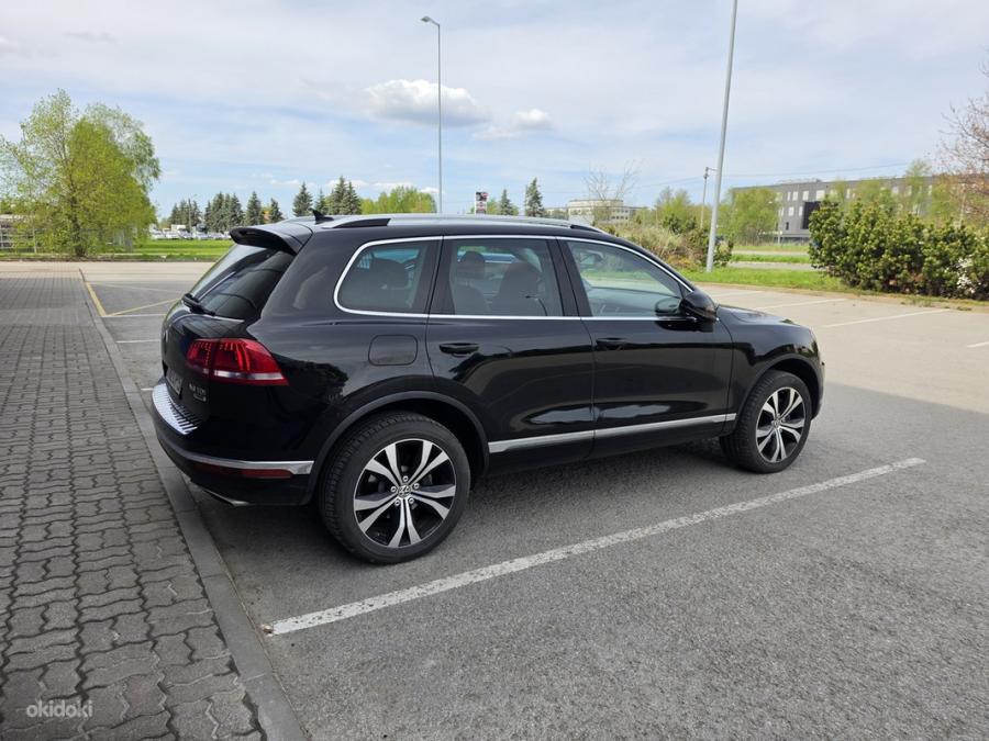 Black Volkswagen Touareg 2015 in Tallinn, with an engine capacity of 3.00 L and mileage of 128 thousand km for 19500 €, photo 17 on AUTOMOTO.COM.LV