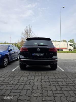 Black Volkswagen Touareg 2015 in Tallinn, with an engine capacity of 3.00 L and mileage of 128 thousand km for 19500 €, photo 20 on AUTOMOTO.COM.LV