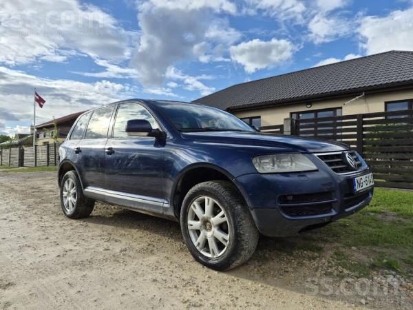 Zils Volkswagen Touareg 2003 Rīga, ar dzinēja tilpumu 2.50 L un nobraukumu 250 tūkst. km par 2650 €, foto 1 vietnē AUTOMOTO.COM.LV