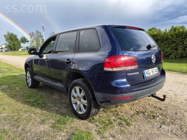 Zils Volkswagen Touareg 2003 Rīga, ar dzinēja tilpumu 2.50 L un nobraukumu 250 tūkst. km par 2650 €, foto 3 vietnē AUTOMOTO.COM.LV