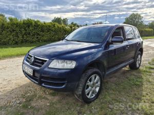 Zils Volkswagen Touareg 2003 Rīga, ar dzinēja tilpumu 2.50 L un nobraukumu 250 tūkst. km par 2650 €, foto 5 vietnē AUTOMOTO.COM.LV