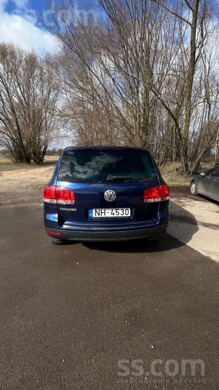 Blue Volkswagen Touareg 2004 in Riga, with an engine capacity of 2.50 L and mileage of 159 thousand km for 5750 €, photo 2 on AUTOMOTO.COM.LV