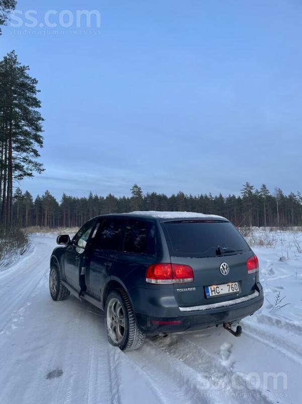 Zils Volkswagen Touareg 2004 Rīga, ar dzinēja tilpumu 3.20 L un nobraukumu 376 tūkst. km par 2500 €, foto 2 vietnē AUTOMOTO.COM.LV
