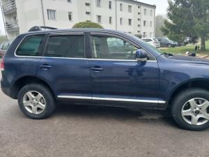 Zils Volkswagen Touareg 2004 Ogre, ar dzinēja tilpumu 3.00 L un nobraukumu 293 tūkst. km par 2300 €, foto 5 vietnē AUTOMOTO.COM.LV