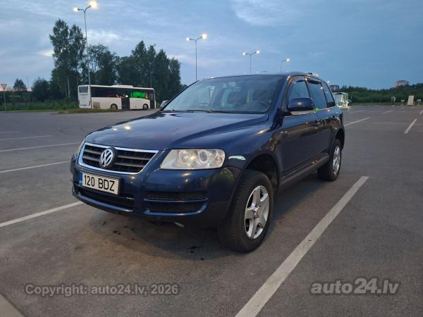 Blue Volkswagen Touareg 2004 in Tallinn, with an engine capacity of 2.50 L and mileage of 281 thousand km for 2499 €, photo 1 on AUTOMOTO.COM.LV