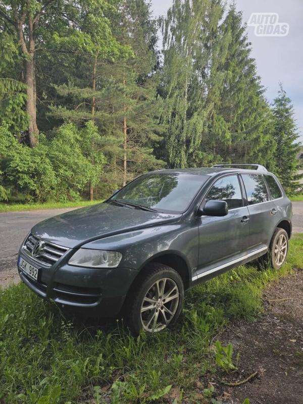 Blue Volkswagen Touareg 2004 in Utena, with an engine capacity of 3.00 L and mileage of 291 thousand km for 2800 €, photo 1 on AUTOMOTO.COM.LV