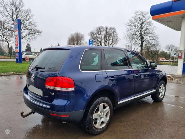 Zils Volkswagen Touareg 2005 Tauragė, ar dzinēja tilpumu 2.46 L un nobraukumu 260 tūkst. km par 2450 €, foto 4 vietnē AUTOMOTO.COM.LV