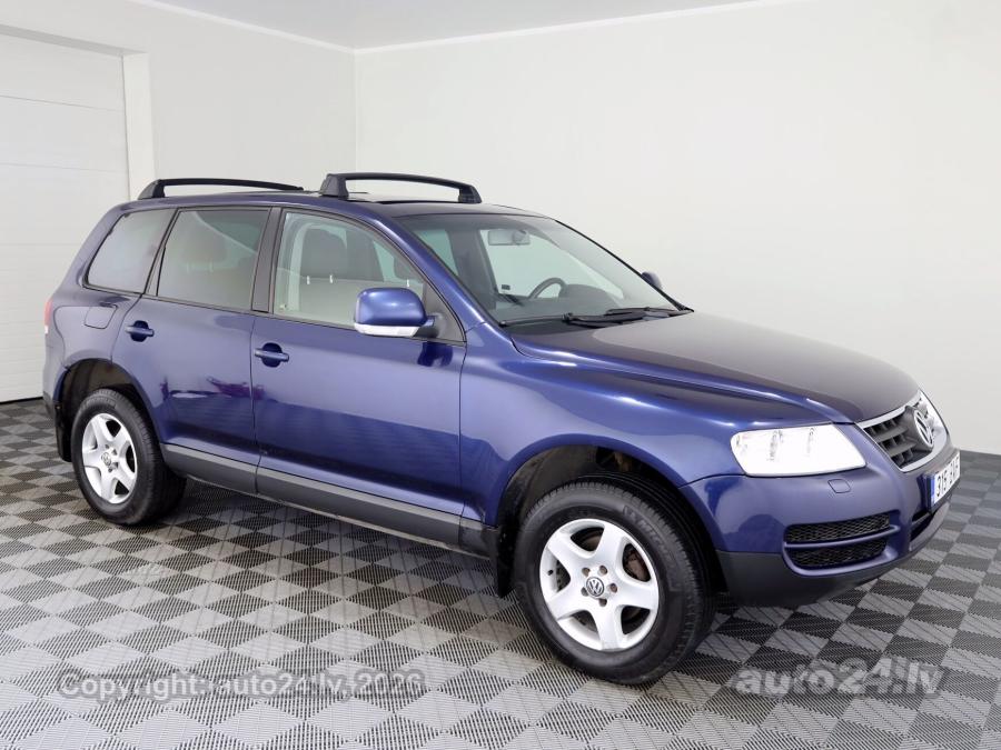 Blue Volkswagen Touareg 2005 in Tallinn, with an engine capacity of 2.50 L and mileage of 369 thousand km for 2199 €, photo 1 on AUTOMOTO.COM.LV