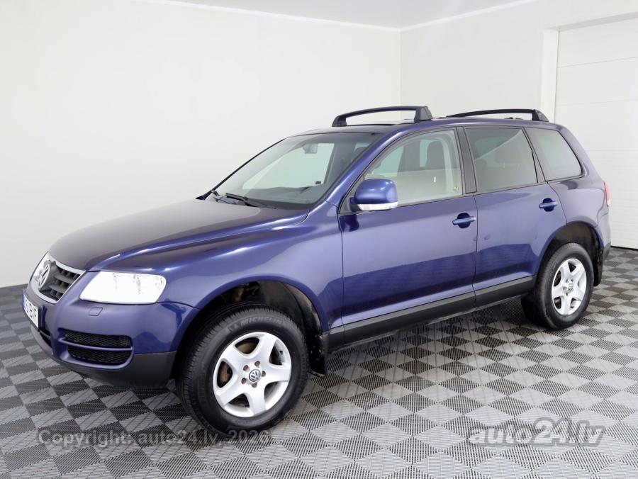 Blue Volkswagen Touareg 2005 in Tallinn, with an engine capacity of 2.50 L and mileage of 369 thousand km for 2199 €, photo 3 on AUTOMOTO.COM.LV