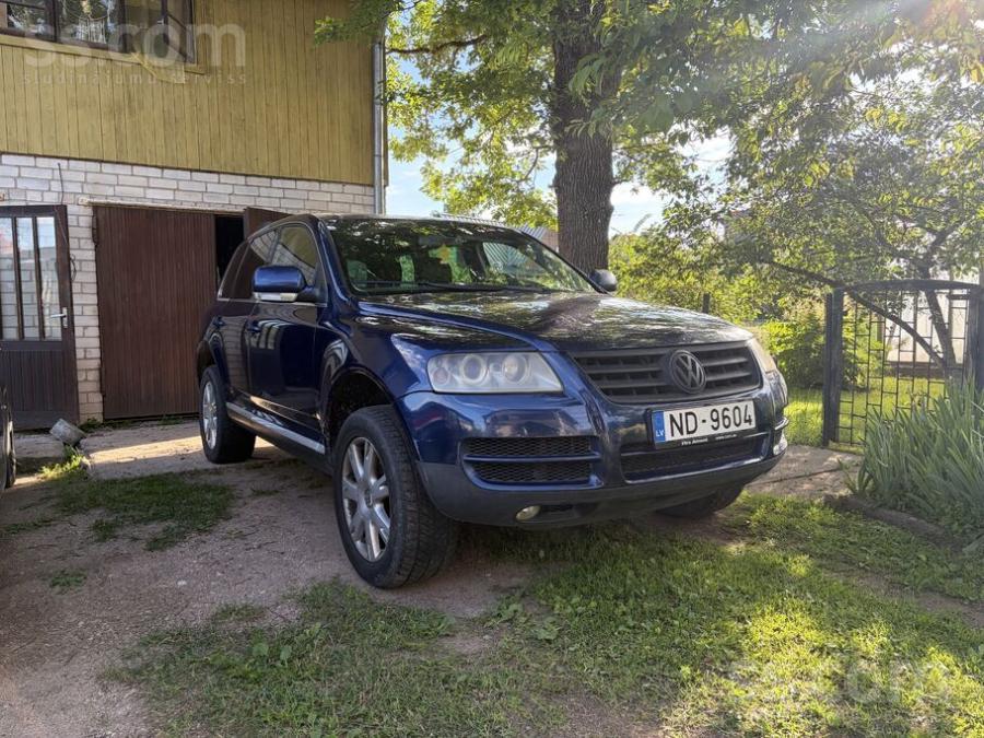 Blue Volkswagen Touareg 2005 in Bauska, with an engine capacity of 2.50 L and mileage of 324 thousand km for 2850 €, photo 3 on AUTOMOTO.COM.LV