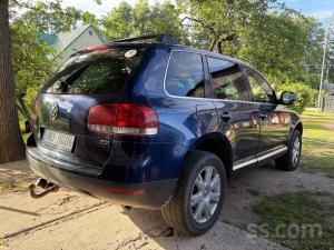 Blue Volkswagen Touareg 2005 in Bauska, with an engine capacity of 2.50 L and mileage of 324 thousand km for 2850 €, photo 5 on AUTOMOTO.COM.LV