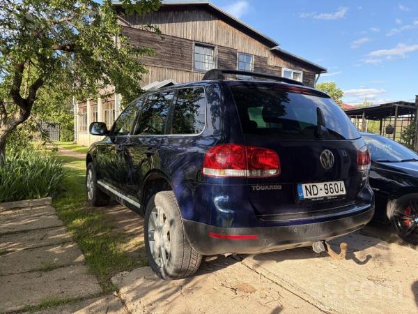 Blue Volkswagen Touareg 2005 in Bauska, with an engine capacity of 2.50 L and mileage of 324 thousand km for 2850 €, photo 3 on AUTOMOTO.COM.LV