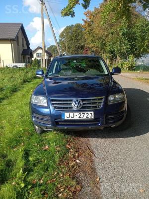 Blue Volkswagen Touareg 2006 in Riga, with an engine capacity of 2.50 L and mileage of 386 thousand km for 4100 €, photo 2 on AUTOMOTO.COM.LV