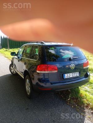 Blue Volkswagen Touareg 2006 in Riga, with an engine capacity of 2.50 L and mileage of 386 thousand km for 4100 €, photo 5 on AUTOMOTO.COM.LV