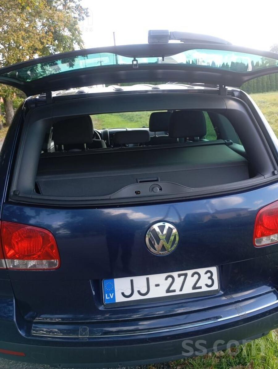 Blue Volkswagen Touareg 2006 in Riga, with an engine capacity of 2.50 L and mileage of 386 thousand km for 4100 €, photo 6 on AUTOMOTO.COM.LV