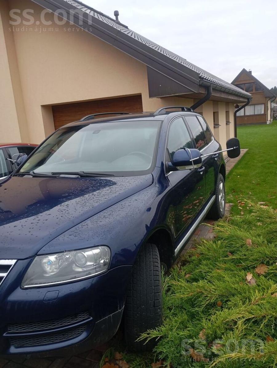 Blue Volkswagen Touareg 2006 in Riga, with an engine capacity of 2.50 L and mileage of 386 thousand km for 4100 €, photo 29 on AUTOMOTO.COM.LV