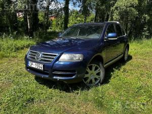 Zils Volkswagen Touareg 2006 Rīga, ar dzinēja tilpumu 3.00 L un nobraukumu 0 tūkst. km par 1750 €, foto 1 vietnē AUTOMOTO.COM.LV