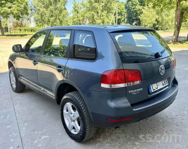 Blue Volkswagen Touareg 2006 in Riga, with an engine capacity of 2.50 L and mileage of 299 thousand km for 2890 €, photo 5 on AUTOMOTO.COM.LV
