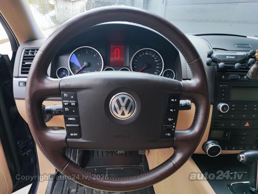 Zils Volkswagen Touareg 2007 Tallina, ar dzinēja tilpumu 3.00 L un nobraukumu 254 tūkst. km par 6900 €, foto 9 vietnē AUTOMOTO.COM.LV