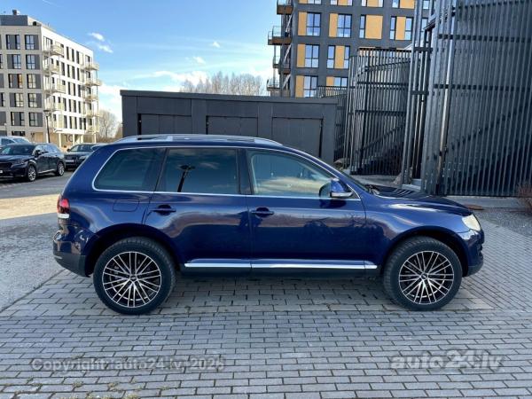 Blue Volkswagen Touareg 2007 in Tartu, with an engine capacity of 3.00 L and mileage of 260 thousand km for 5999 €, photo 5 on AUTOMOTO.COM.LV
