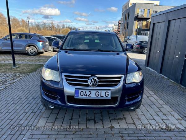 Blue Volkswagen Touareg 2007 in Tartu, with an engine capacity of 3.00 L and mileage of 260 thousand km for 5999 €, photo 7 on AUTOMOTO.COM.LV