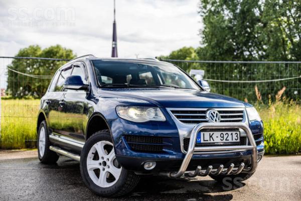 Blue Volkswagen Touareg 2007 in Riga, with an engine capacity of 3.00 L and mileage of 347 thousand km for 5990 €, photo 2 on AUTOMOTO.COM.LV