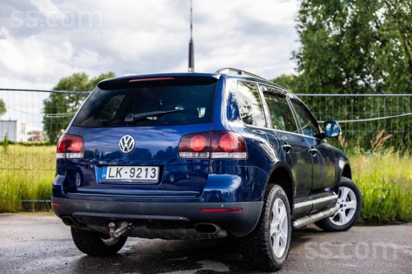 Blue Volkswagen Touareg 2007 in Riga, with an engine capacity of 3.00 L and mileage of 347 thousand km for 5990 €, photo 7 on AUTOMOTO.COM.LV