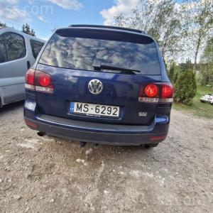 Zils Volkswagen Touareg 2008 Rīga, ar dzinēja tilpumu 3.00 L un nobraukumu 311 tūkst. km par 22700 €, foto 1 vietnē AUTOMOTO.COM.LV
