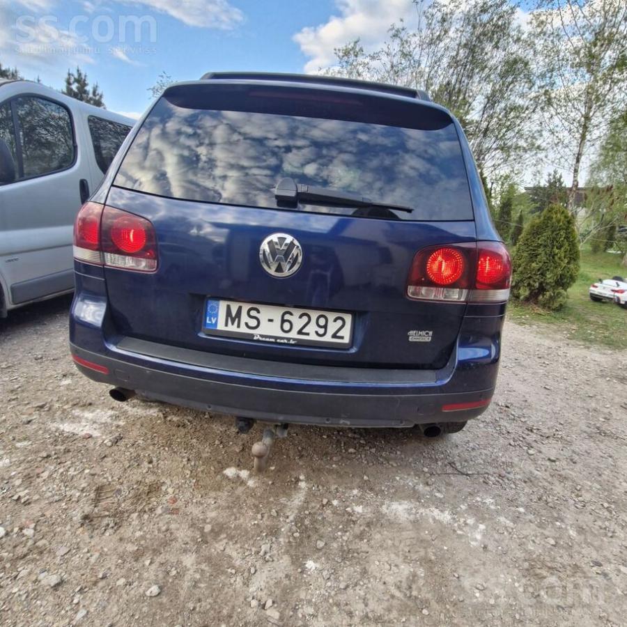 Zils Volkswagen Touareg 2008 Rīga, ar dzinēja tilpumu 3.00 L un nobraukumu 311 tūkst. km par 22700 €, foto 1 vietnē AUTOMOTO.COM.LV