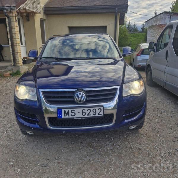 Blue Volkswagen Touareg 2008 in Riga, with an engine capacity of 3.00 L and mileage of 311 thousand km for 22700 €, photo 2 on AUTOMOTO.COM.LV