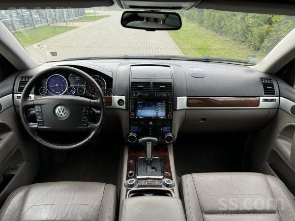 Blue Volkswagen Touareg 2008 in Riga, with an engine capacity of 3.00 L and mileage of 265 thousand km for 4350 €, photo 11 on AUTOMOTO.COM.LV
