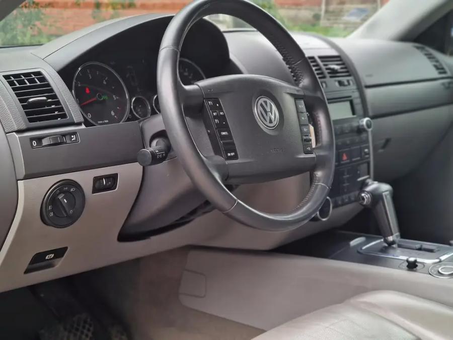 Blue Volkswagen Touareg 2008 in Grobiņa, with an engine capacity of 3.00 L and mileage of 436 thousand km for 4750 €, photo 17 on AUTOMOTO.COM.LV