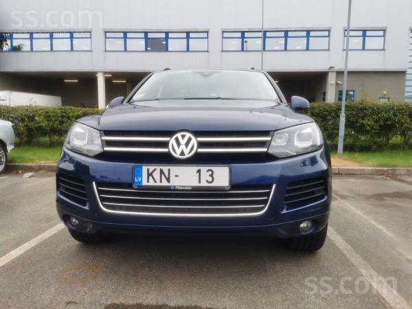 Blue Volkswagen Touareg 2010 in Riga, with an engine capacity of 4.20 L and mileage of 439 thousand km for 13950 €, photo 3 on AUTOMOTO.COM.LV