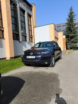 Blue Volkswagen Touareg 2011 in Riga, with an engine capacity of 3.00 L and mileage of 293 thousand km for 10990 €, photo 1 on AUTOMOTO.COM.LV