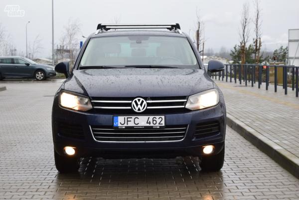 Blue Volkswagen Touareg 2011 in Vilnius, with an engine capacity of 3.00 L and mileage of 274 thousand km for 9550 €, photo 2 on AUTOMOTO.COM.LV