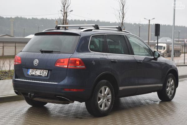 Blue Volkswagen Touareg 2011 in Vilnius, with an engine capacity of 3.00 L and mileage of 274 thousand km for 9550 €, photo 4 on AUTOMOTO.COM.LV