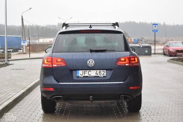 Blue Volkswagen Touareg 2011 in Vilnius, with an engine capacity of 3.00 L and mileage of 274 thousand km for 9550 €, photo 5 on AUTOMOTO.COM.LV