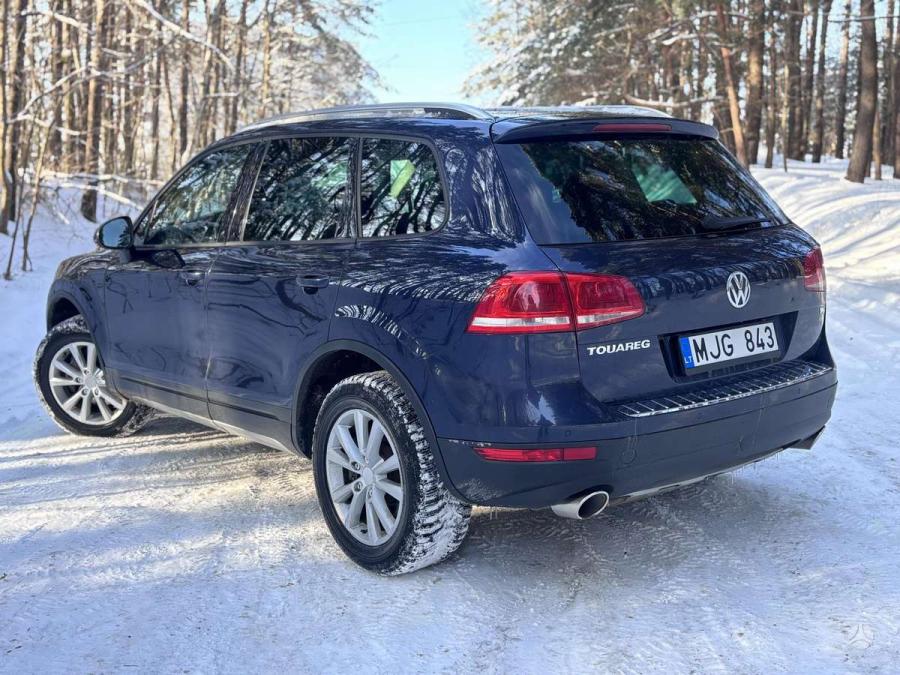 Blue Volkswagen Touareg 2011 in Vilnius, with an engine capacity of 3.00 L and mileage of 350 thousand km for 7899 €, photo 7 on AUTOMOTO.COM.LV