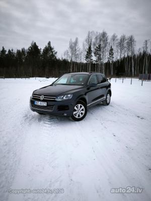 Blue Volkswagen Touareg 2011 in Riga, with an engine capacity of 3.00 L and mileage of 307 thousand km for 9850 €, photo 2 on AUTOMOTO.COM.LV