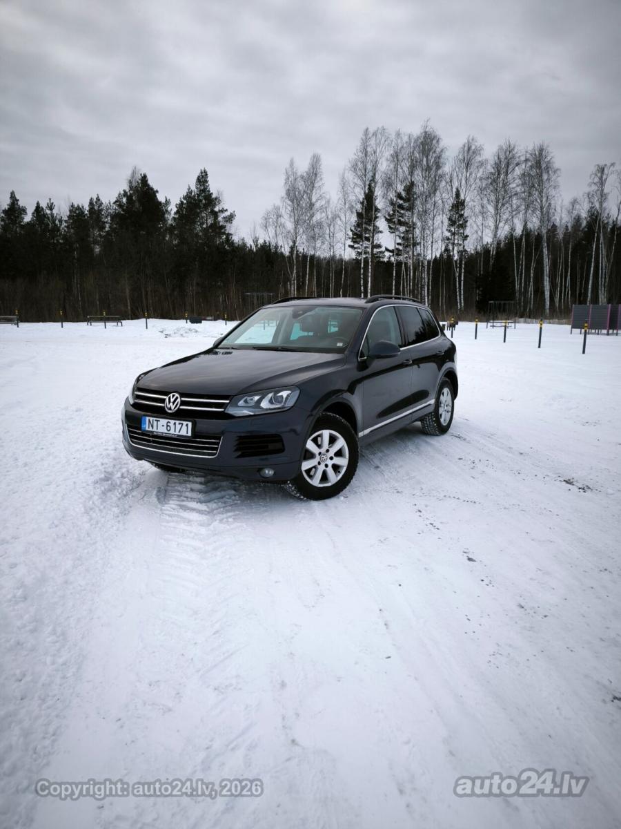 Blue Volkswagen Touareg 2011 in Riga, with an engine capacity of 3.00 L and mileage of 307 thousand km for 9850 €, photo 2 on AUTOMOTO.COM.LV