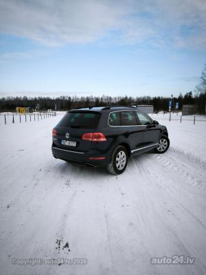 Blue Volkswagen Touareg 2011 in Riga, with an engine capacity of 3.00 L and mileage of 307 thousand km for 9850 €, photo 3 on AUTOMOTO.COM.LV
