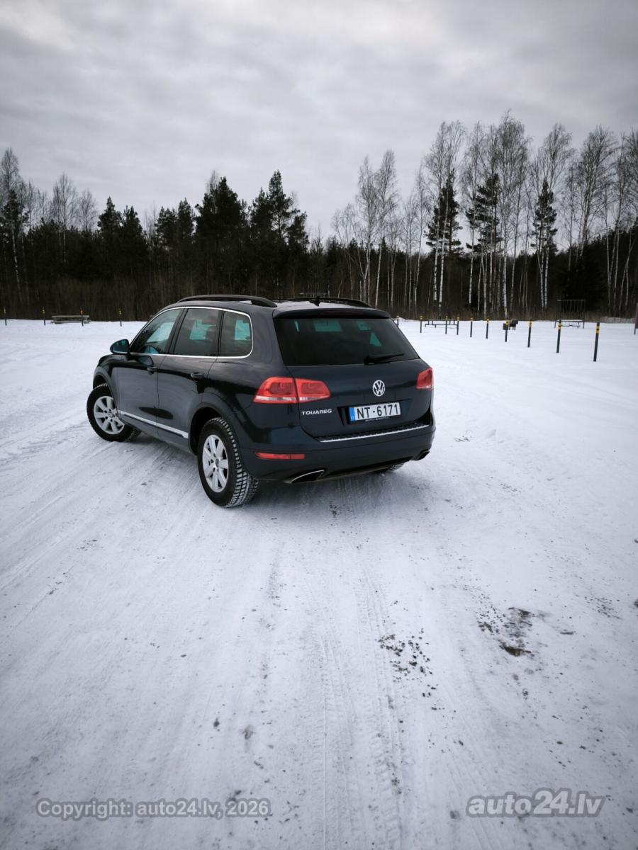Blue Volkswagen Touareg 2011 in Riga, with an engine capacity of 3.00 L and mileage of 307 thousand km for 9850 €, photo 4 on AUTOMOTO.COM.LV