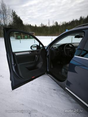 Blue Volkswagen Touareg 2011 in Riga, with an engine capacity of 3.00 L and mileage of 307 thousand km for 9850 €, photo 5 on AUTOMOTO.COM.LV