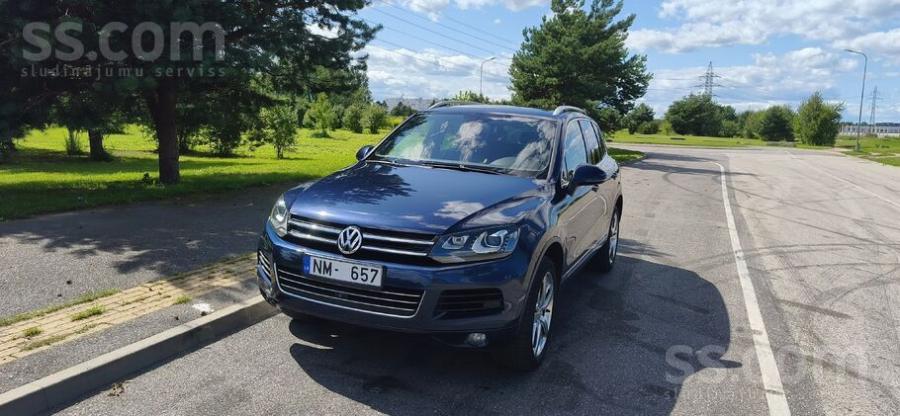 Zils Volkswagen Touareg 2011 Rīga, ar dzinēja tilpumu 3.00 L un nobraukumu 259 tūkst. km par 10500 €, foto 1 vietnē AUTOMOTO.COM.LV